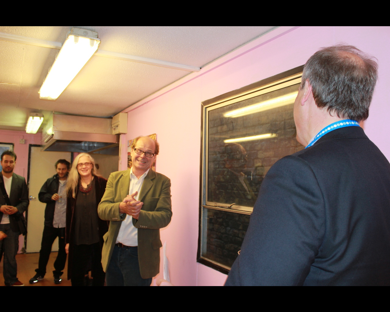 Peter Mackeonis welcoming Lord Bates to the Shoreditch Art Wall